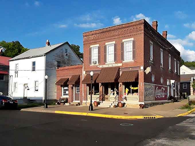 Those striped awnings and brick details create a streetscape that's pure Americana at its most charming and authentic.