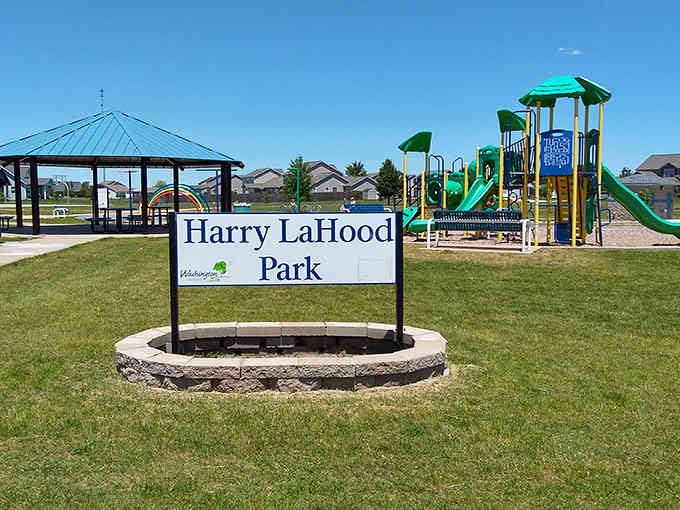 Harry LaHood Park welcomes families with bright playgrounds and pavilions where memories cost nothing but time.