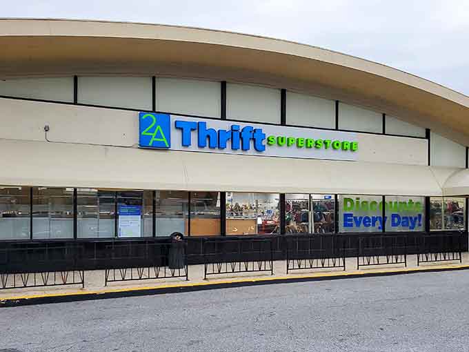 Yellow safety bollards stand guard like friendly sentries welcoming thousands of daily deal seekers through those doors.