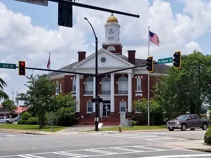 The courthouse anchors downtown with timeless brick dignity, watching over generations of community gatherings and Friday night football talk.
