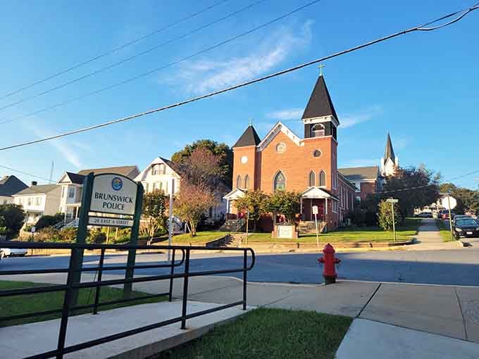 Church steeples punctuate neighborhoods where Sunday mornings still mean something special to the community gathered below.