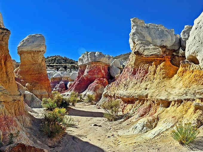 Nature's own art gallery where wind and water carved these colorful spires into shapes that defy logic and inspire wonder.