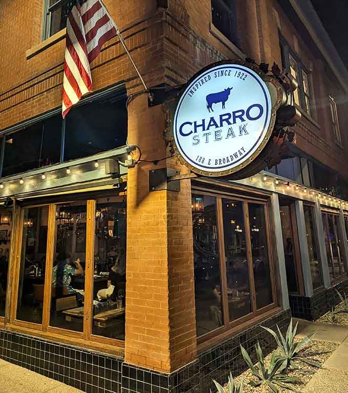 Evening lights illuminate a corner spot where Southwestern flavors transform traditional steakhouse fare into something magical.