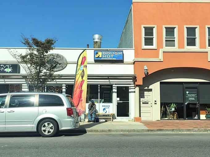That colorful street-side banner waves you in like a friendly neighbor inviting you for morning coffee.