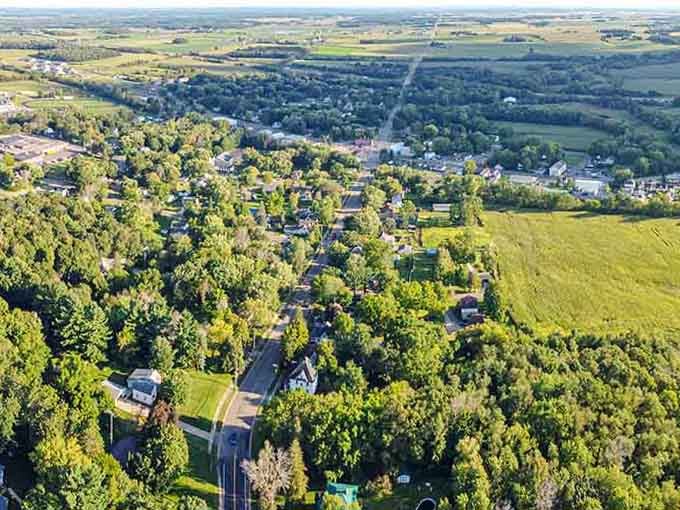 Tree-lined streets and farmland create a patchwork quilt of green that reminds you why they call this God's country.