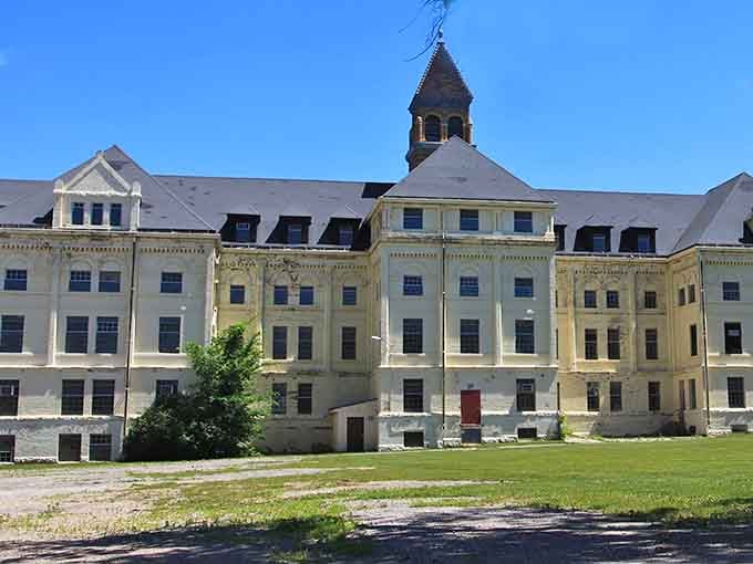 The pale yellow facade gleams in the sunlight, reminding us that beautiful buildings deserve to be preserved for future generations.