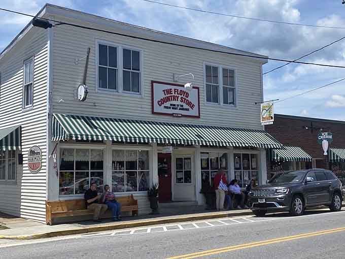 Those green-striped awnings and folks gathering outside prove community still exists in small-town America.