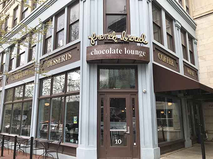 The elegant corner entrance promises sophisticated sweets where desserts and coffee meet in perfect downtown harmony.
