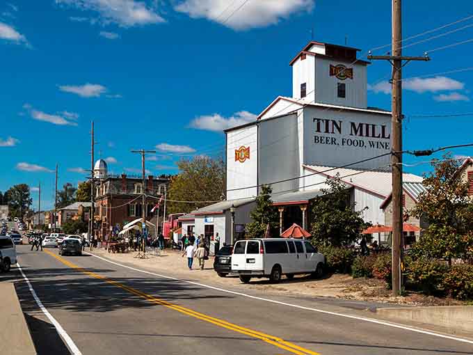 The Tin Mill's converted grain elevator towers over the street like a lighthouse guiding hungry travelers to beer and good times.