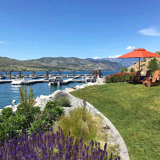 Purple flowers, orange umbrellas, and that impossibly blue water &ndash; Lake Chelan's marina life is calling your name loudly.