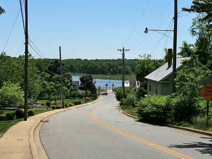 That gentle hill draws your eye toward the heart of town, promising discoveries around every bend ahead.