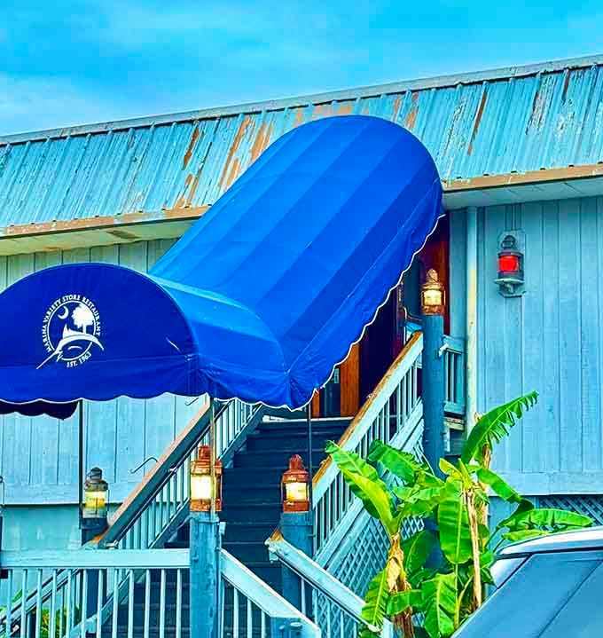 The coastal blue and white color scheme perfectly captures that breezy waterfront feeling, even before you taste the seafood.