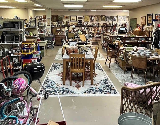 Furniture fills every corner like someone's entire estate decided to have a yard sale indoors, minus the haggling neighbors.