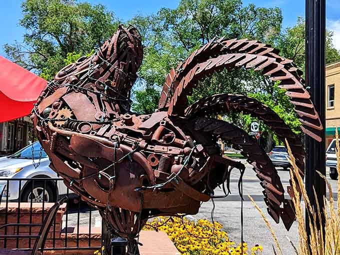 The intricate metalwork captures the spirit of Mike, proving that sometimes the most unlikely heroes have feathers and attitude.