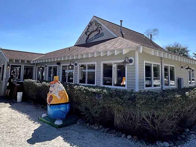 The classic beach cottage architecture with its peaked roof and windows promises old-school seafood charm done absolutely right inside.