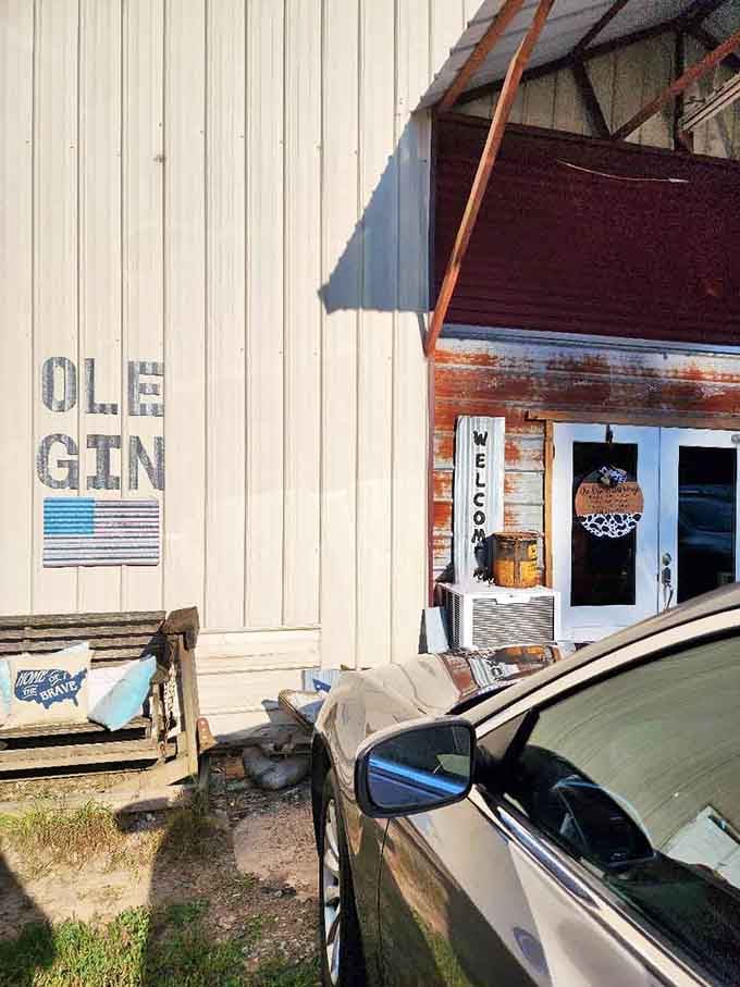 That weathered metal siding and patriotic flag signal authentic Southern hospitality waiting inside for hungry diners.