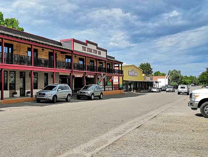 The historic main street stretches toward distant hills, where time moves slower and neighbors still wave from their porches.