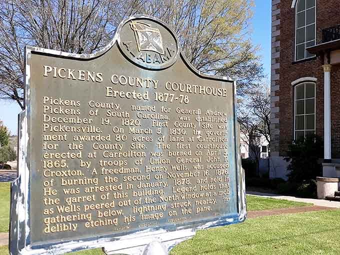 The historical marker tells the dramatic story of lightning, justice, and a face frozen in time forever.