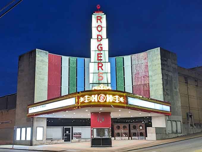 The vintage Rodger's marquee glows against twilight sky like a beacon calling movie lovers home for popcorn.