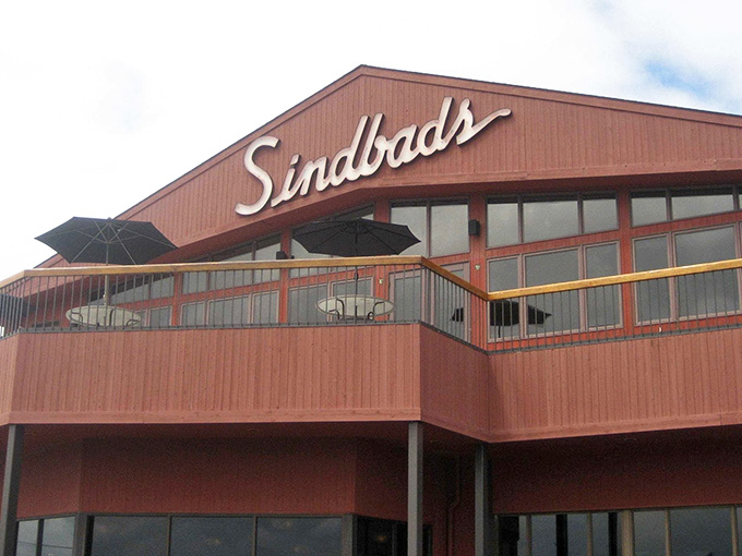 The double-deck patio setup means sunset views come standard with your seafood and good company.