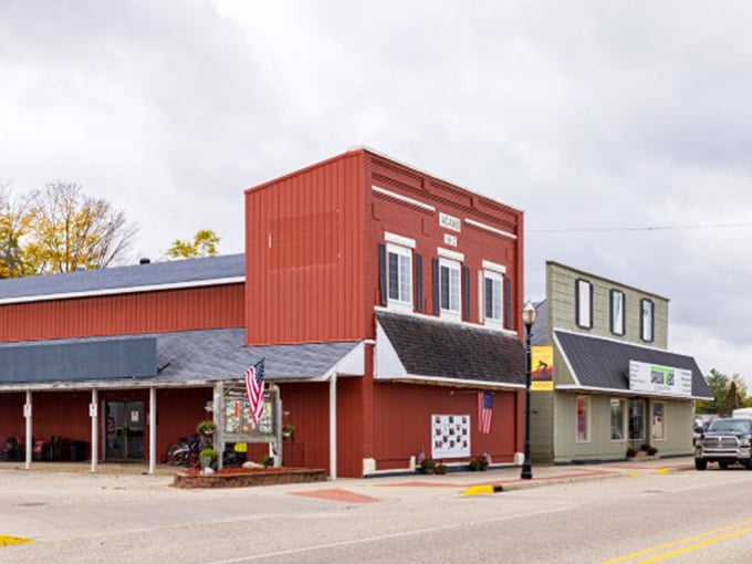 Classic storefronts wear their patriotic pride openly, creating a main street that honors tradition while welcoming tomorrow.