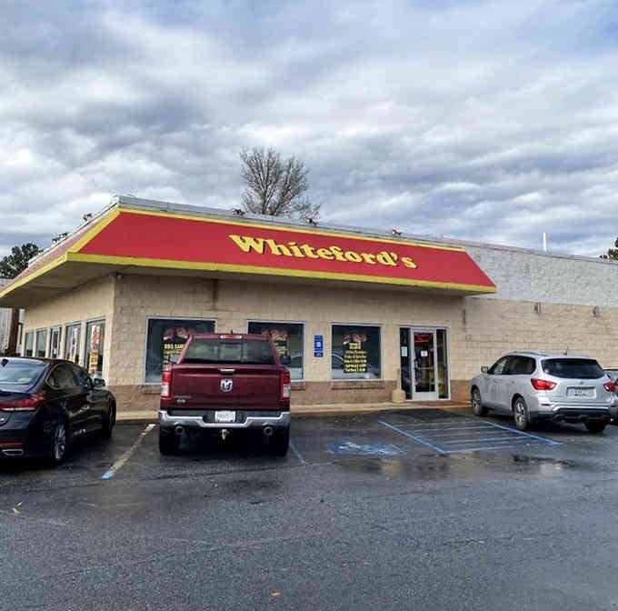 The bright red roof signals good eating ahead, where parking lots fill up because word travels fast about satisfying meals.
