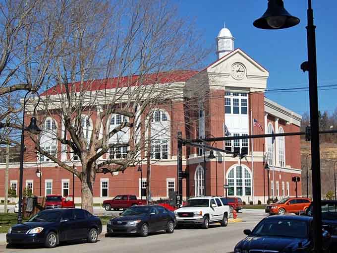 The courthouse stands proud in brick and white, anchoring a town square that still matters to residents.