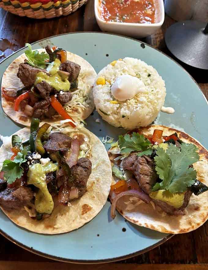 Steak fajita-style tacos with peppers and that perfect char remind you why beef never goes out of style.