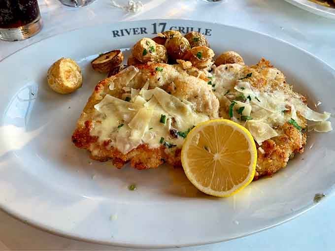Lemon chicken parmesan gets the crispy, cheesy treatment it deserves, complete with roasted potatoes for good measure.