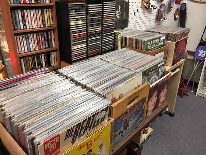 Vinyl records stacked like musical time capsules, each one ready to transport you back to better dance moves.