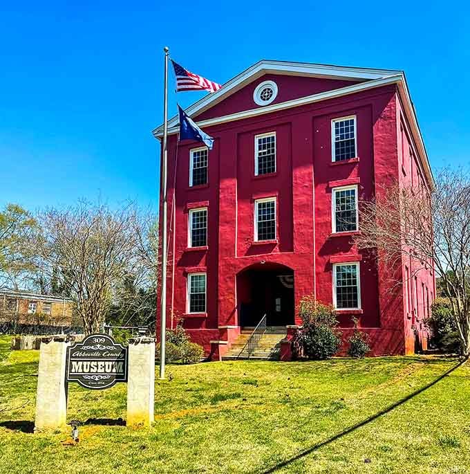 The Abbeville County Museum's distinctive red exterior houses stories that bring local history to vivid, tangible life.