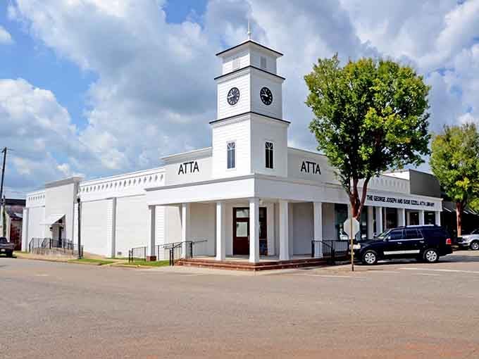 This pristine white building with its clock tower serves as the ATTA, blending history and learning beautifully.