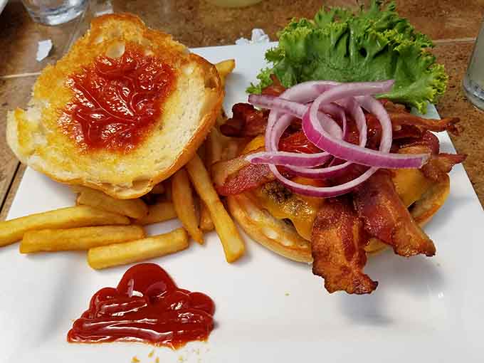 Bacon, cheese, and a bun that's seen better days, but honestly, who's complaining when it tastes this good?