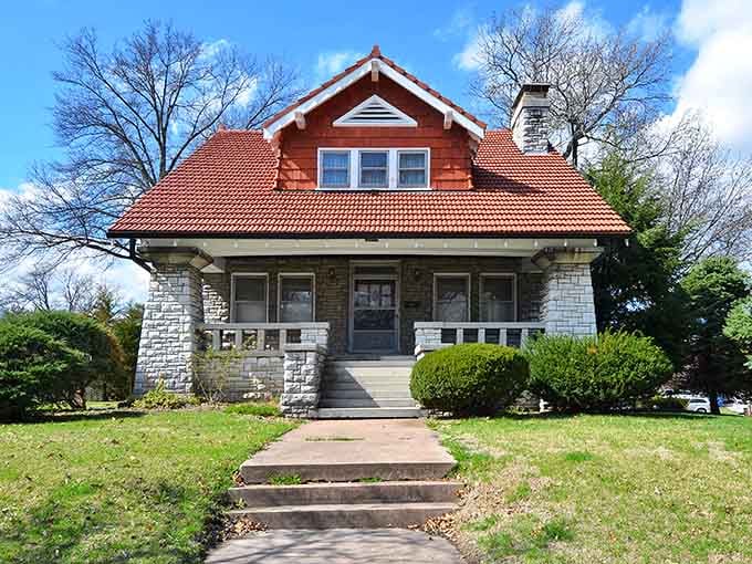 Craftsman-style beauty with stone pillars that have witnessed more than a century of Alton's colorful history.