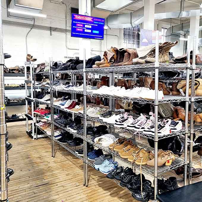 Rows of shoes organized like a footwear library, because everyone deserves comfortable kicks without the sticker shock.