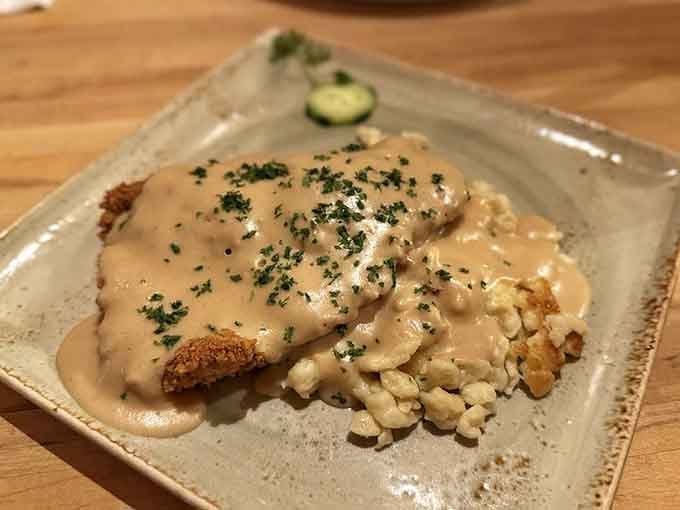 Creamy sauce cascading over breaded perfection with sp&auml;tzle, this is comfort food that requires a post-meal nap.