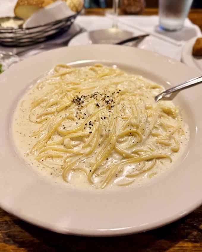 Silky fettuccine alfredo so creamy and perfect it could make Dean Martin weep with joy.
