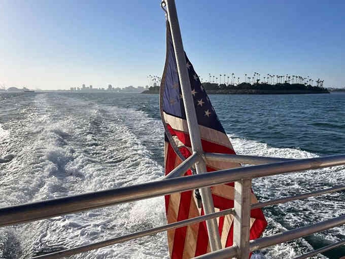That American flag snapping in the breeze while the wake spreads behind you, this is commuting done right.