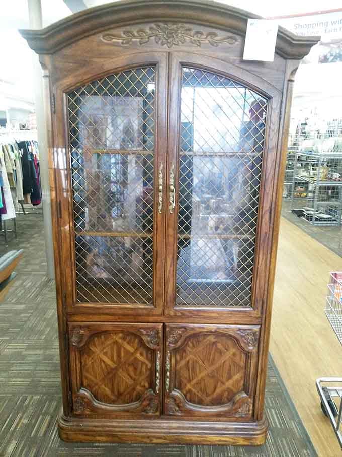 This ornate wooden cabinet has more character than most reality TV stars and costs considerably less to maintain.
