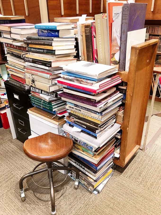 These towering stacks would make Marie Kondo faint, but they spark pure joy for anyone who loves literature.