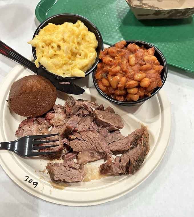 That's what a proper barbecue plate looks like: brisket, beans, mac and cheese, and pure happiness.