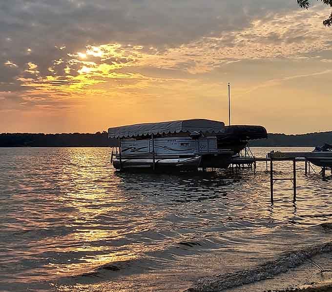 Pontoon boats bob gently at sunset, waiting for tomorrow's adventures on these pristine Wisconsin waters.