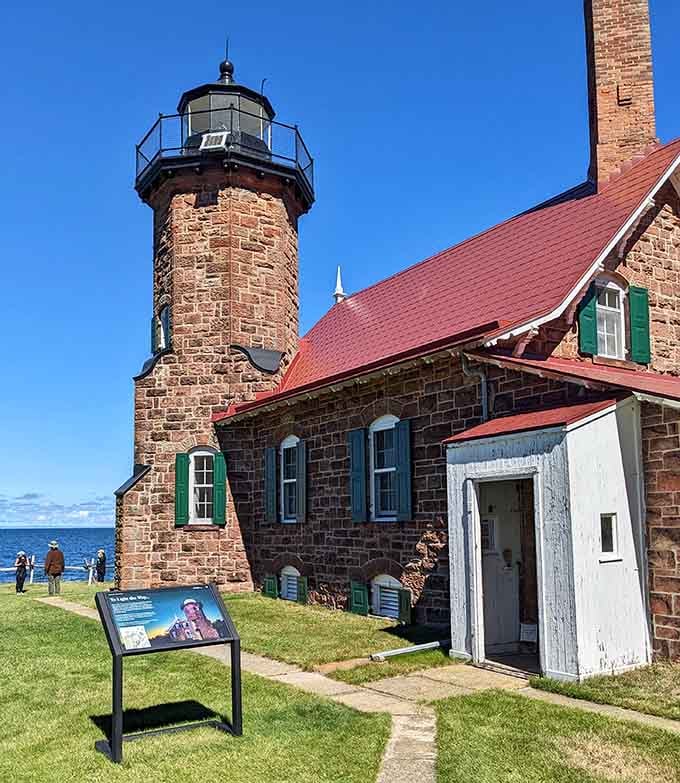 This brownstone lighthouse has been guiding sailors home since before your grandparents were born, and it's still on duty.