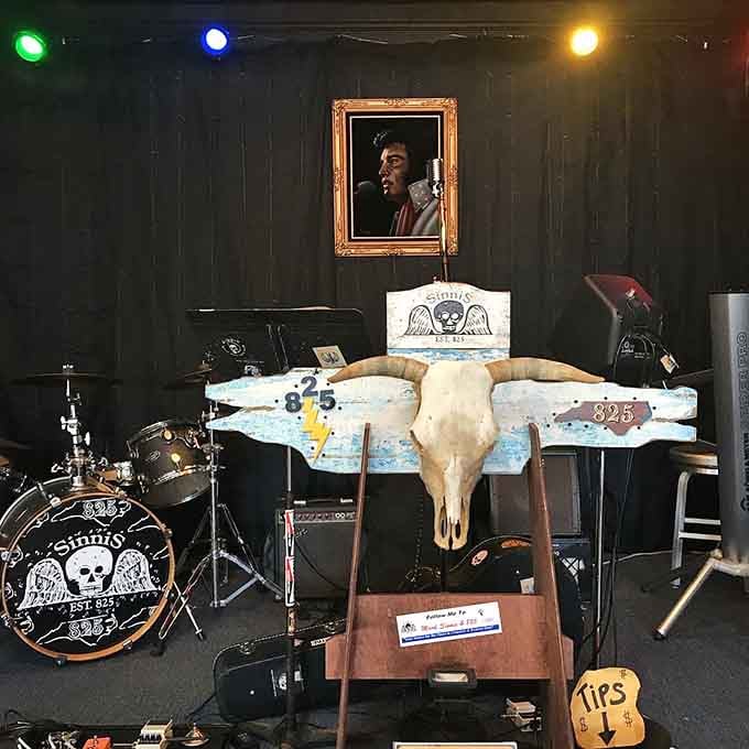 That stage setup with Elvis watching over creates an atmosphere where music history feels wonderfully alive and present.