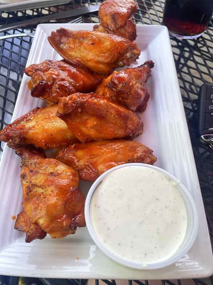 These wings have that perfect golden-brown finish that makes you forget about counting calories and just enjoy the moment.