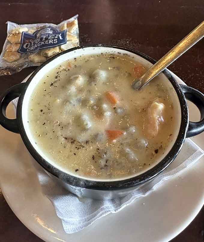 Chicken wild rice soup served in a proper crock with crackers&mdash;comfort food that actually comforts your soul.