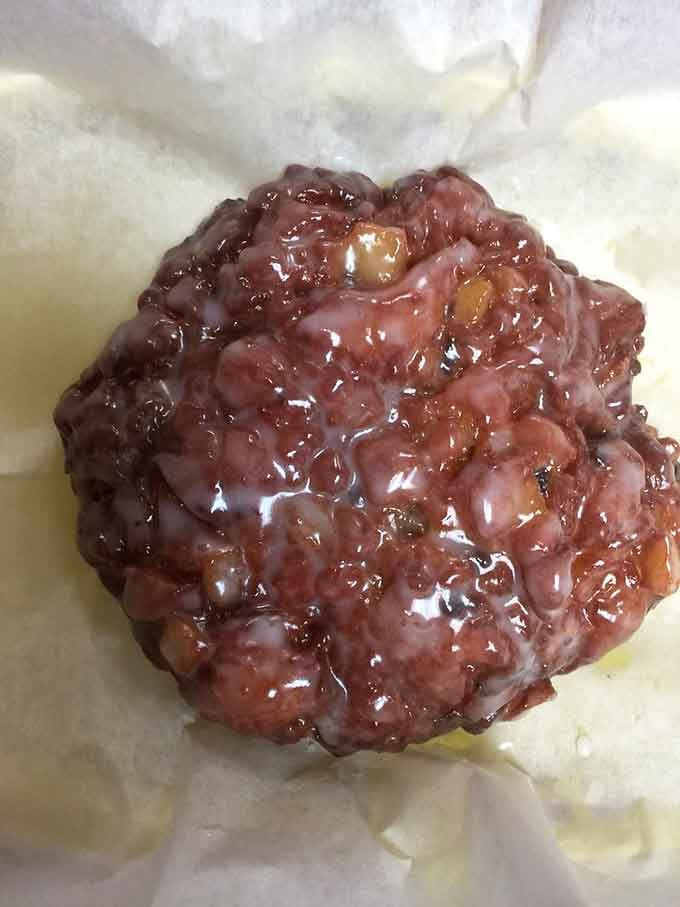 This apple fritter has more personality than most people, with a glaze that catches light like edible gold.