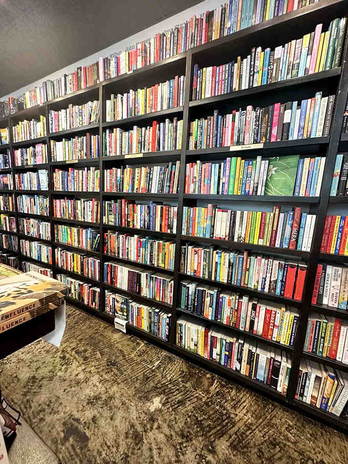 Floor-to-ceiling shelves showcase an impressive collection, proof that independent bookstores still know how to do it right.