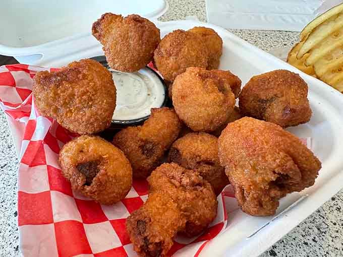 Golden fried mushrooms that prove vegetables can be just as indulgent as anything else on the menu here.