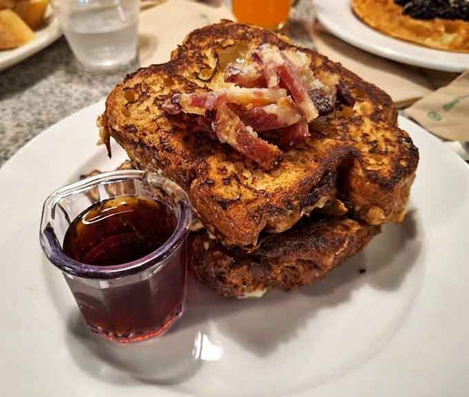 Thick-cut French toast topped with crispy bacon proves that breakfast doesn't have to choose between sweet and savory.